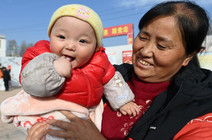 People bustle on the first day of 2024 in relocation sites of NW China ...